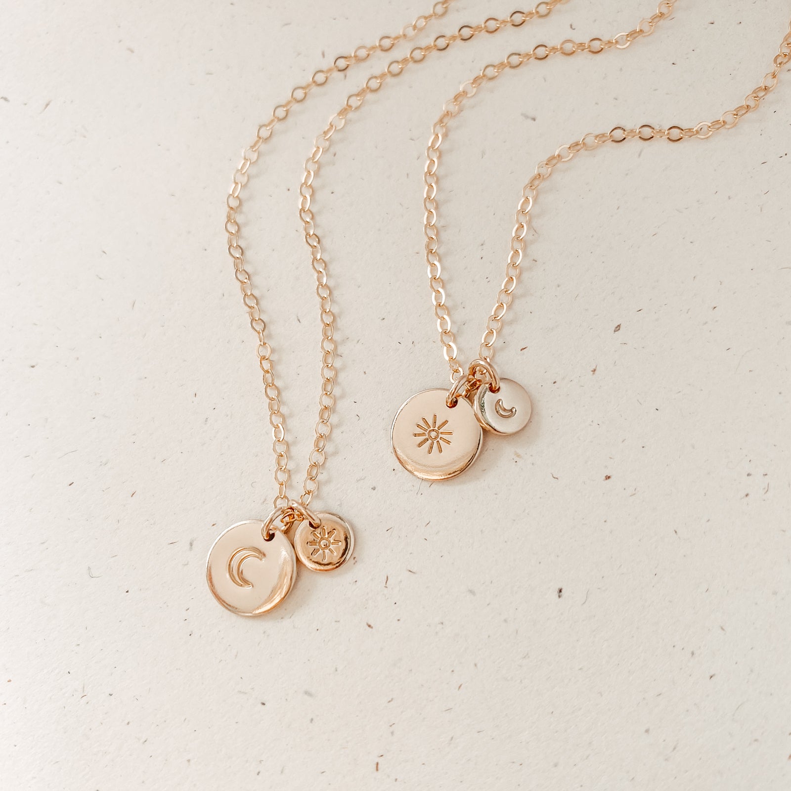 Sun symbol necklace store
